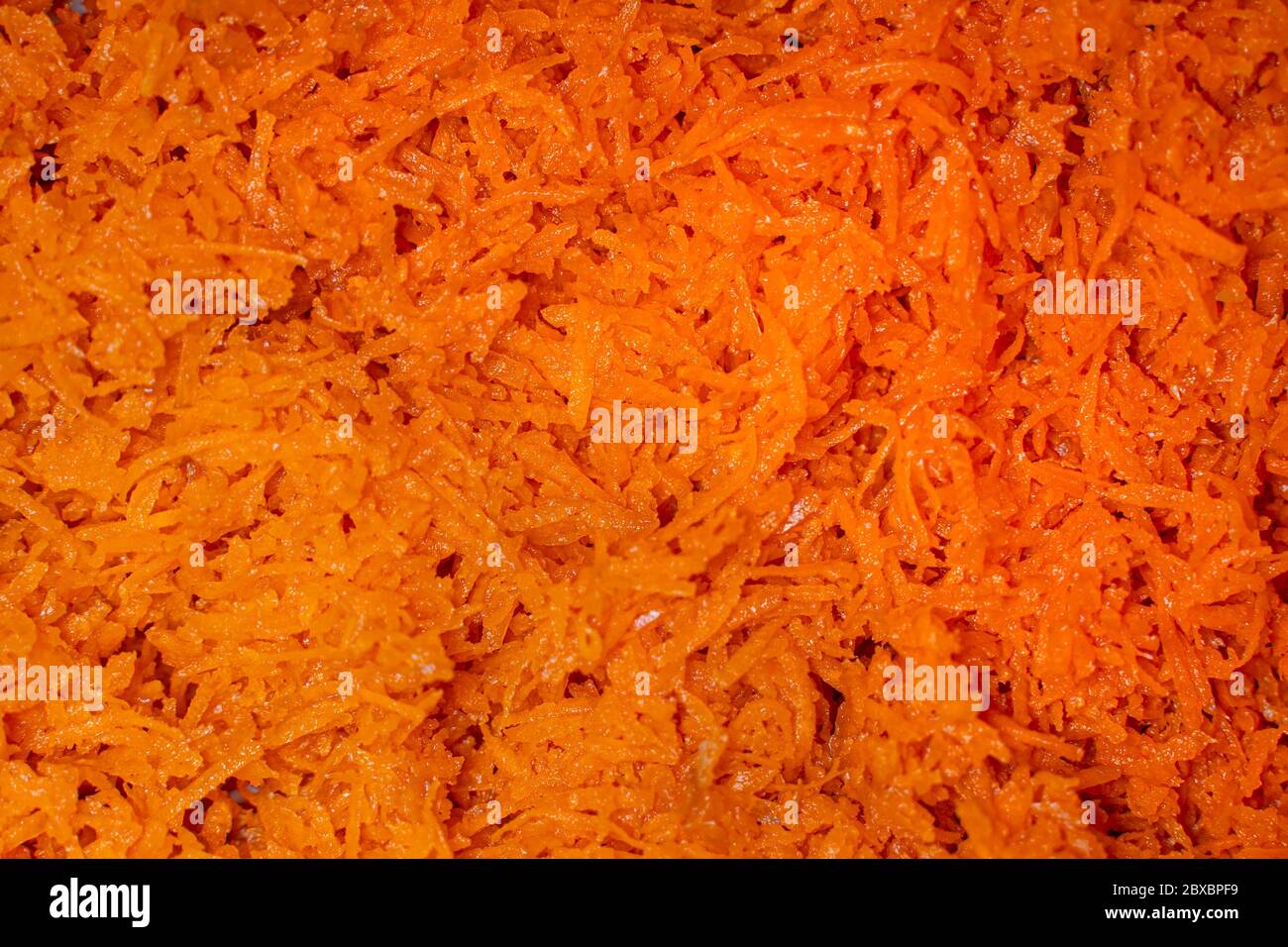 Grated carrot fresh background. Top view texture Stock Photo - Alamy