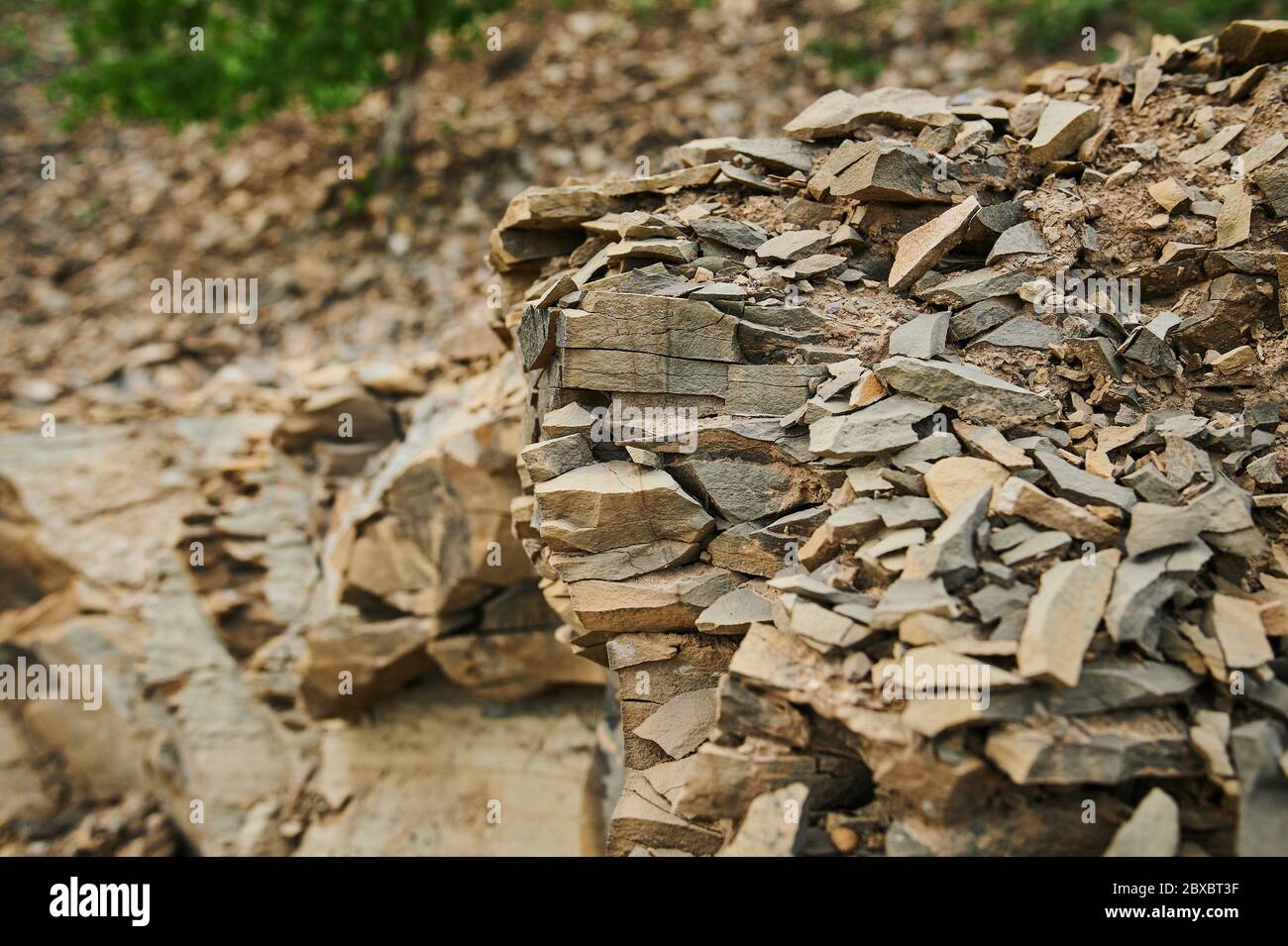 Layers of soil with groundwater. Details of earth layers in a clay pit ...