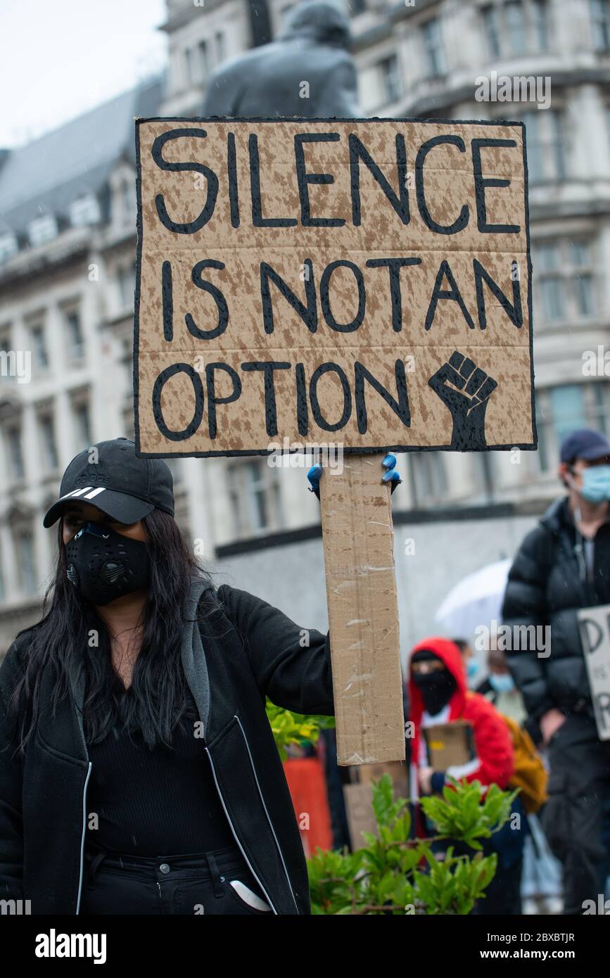 Protester holding campaign poster/sign, at the London Black Lives ...