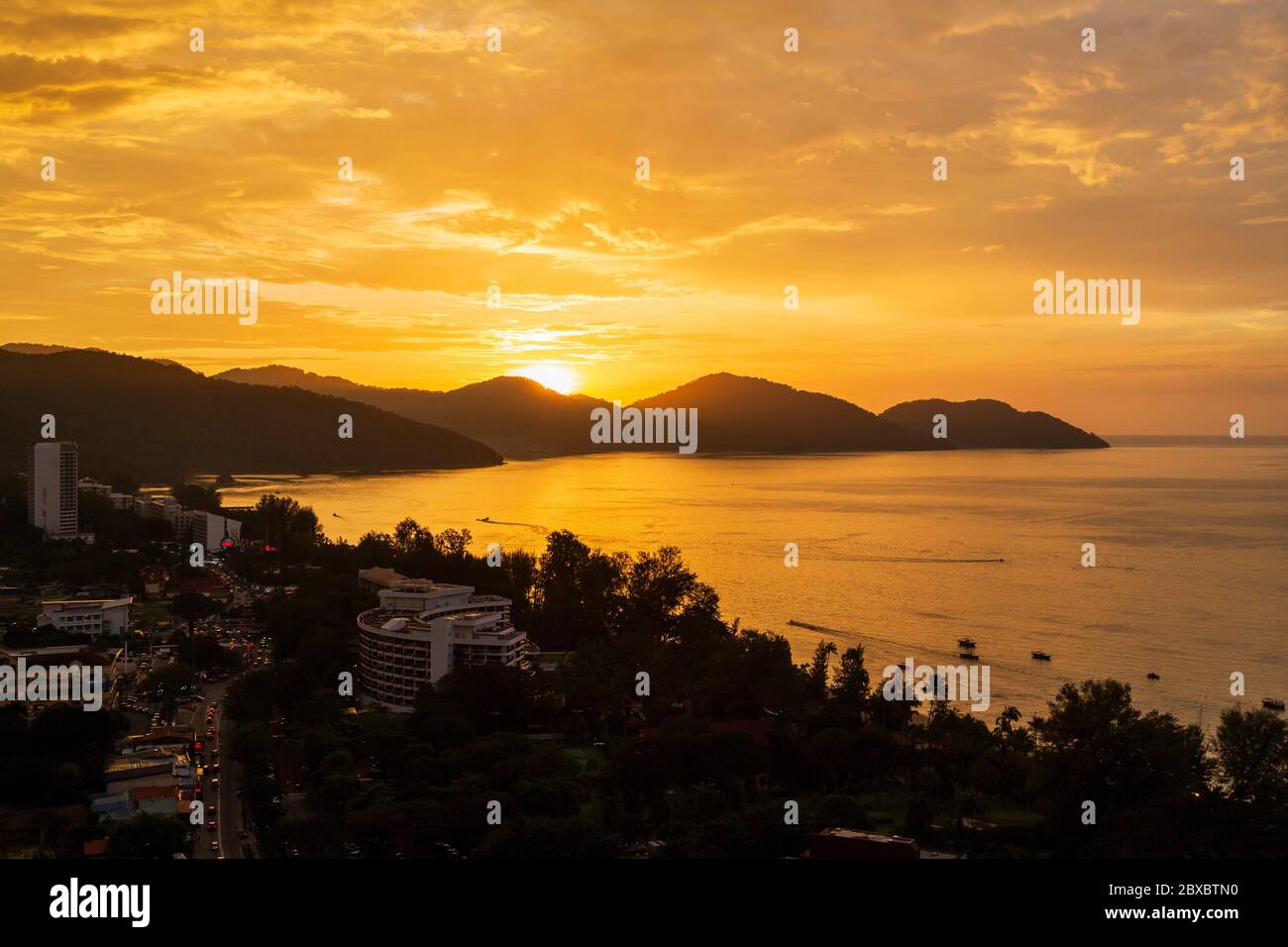 Batu Ferringhi Beach on Penang Island in Malaysia during sunset Stock ...