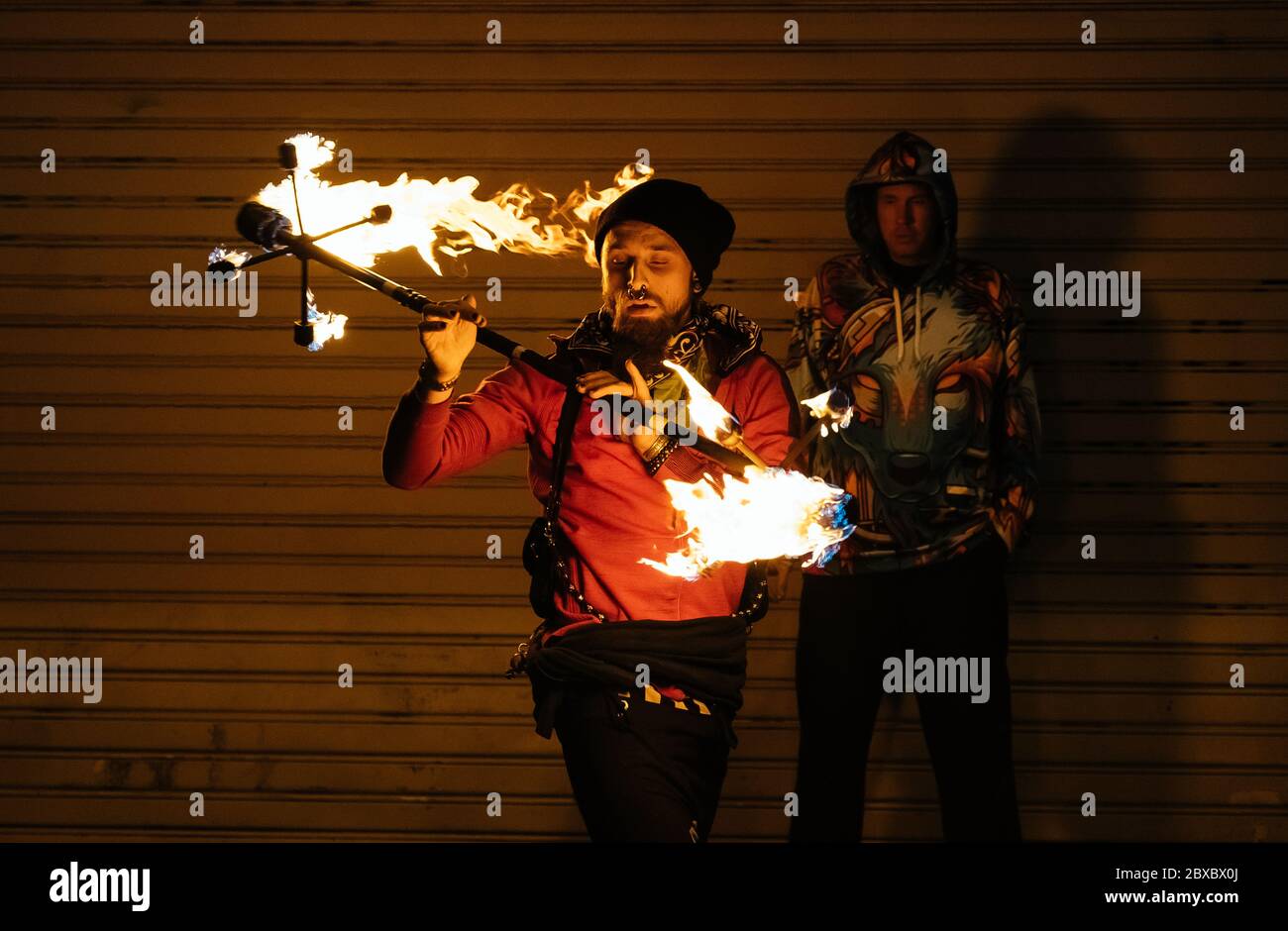 Fire dancers performing on the street Stock Photo - Alamy
