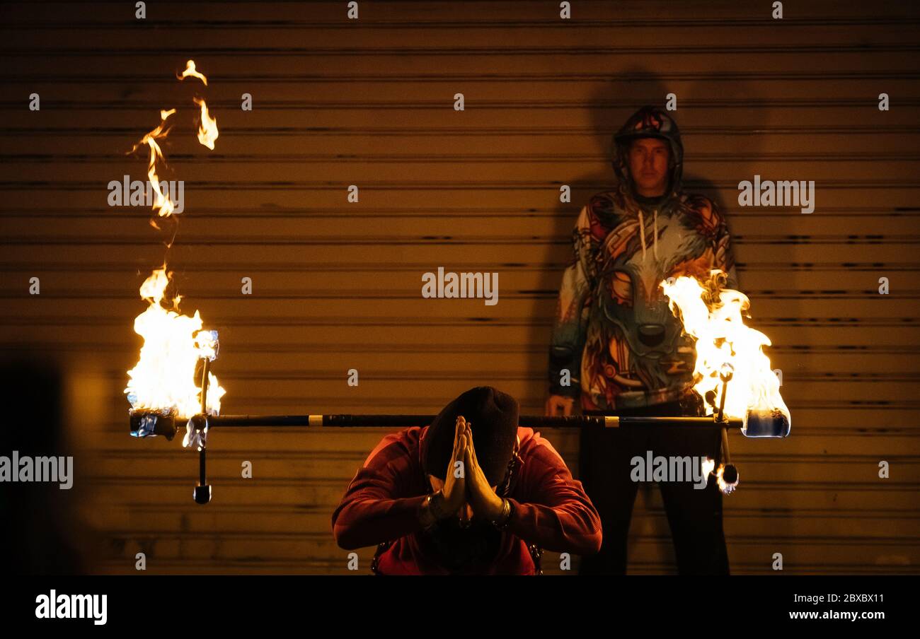 Fire dancers performing on the street Stock Photo - Alamy