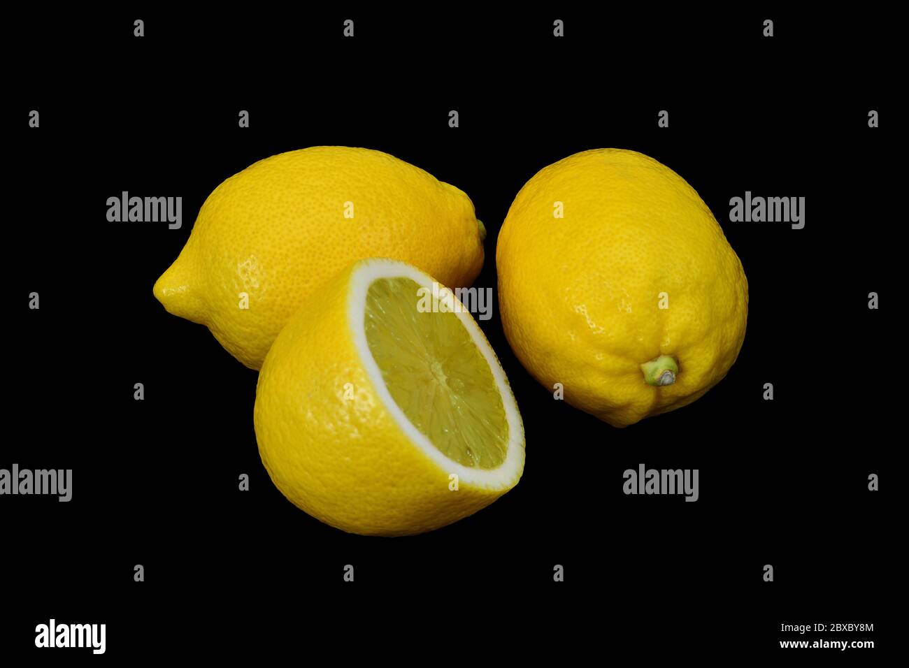 Half lemon on a black background Stock Photo - Alamy