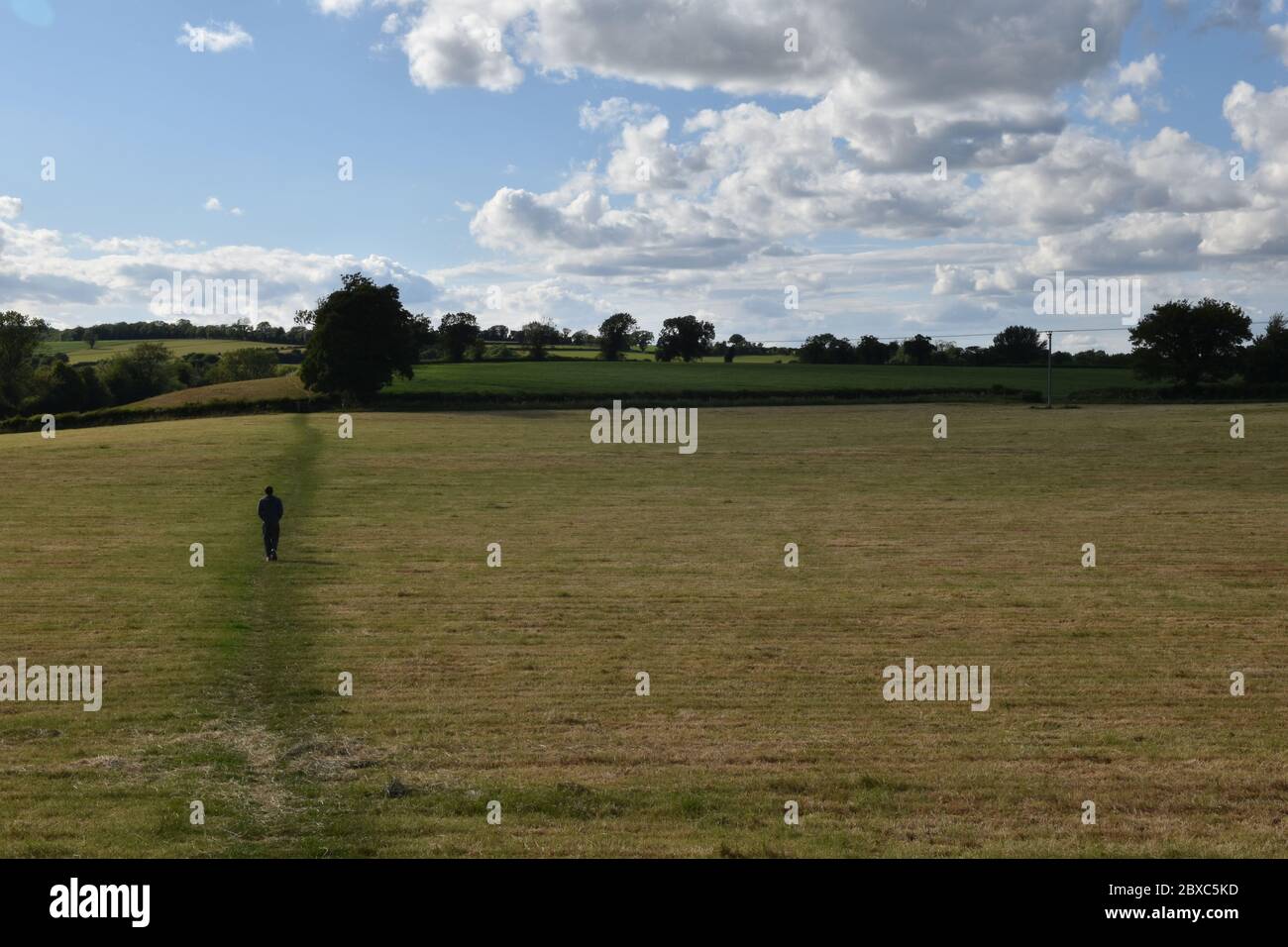 Walking the fields hi-res stock photography and images - Alamy