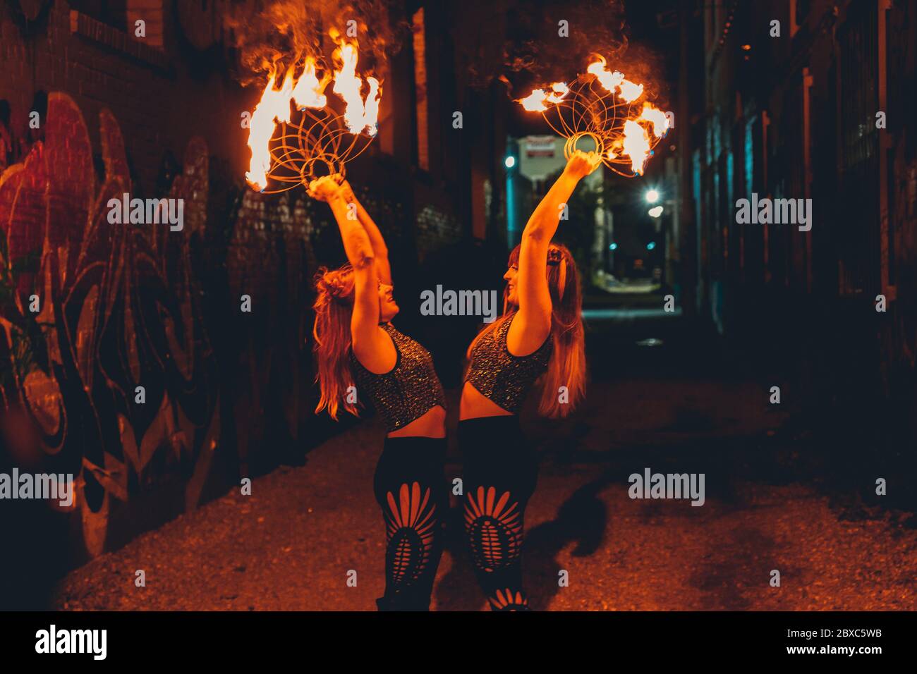 Fire dancers performing on the street Stock Photo - Alamy