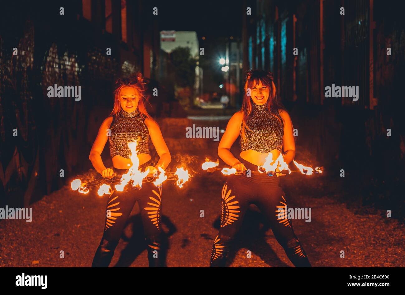 Fire dancers performing on the street Stock Photo - Alamy