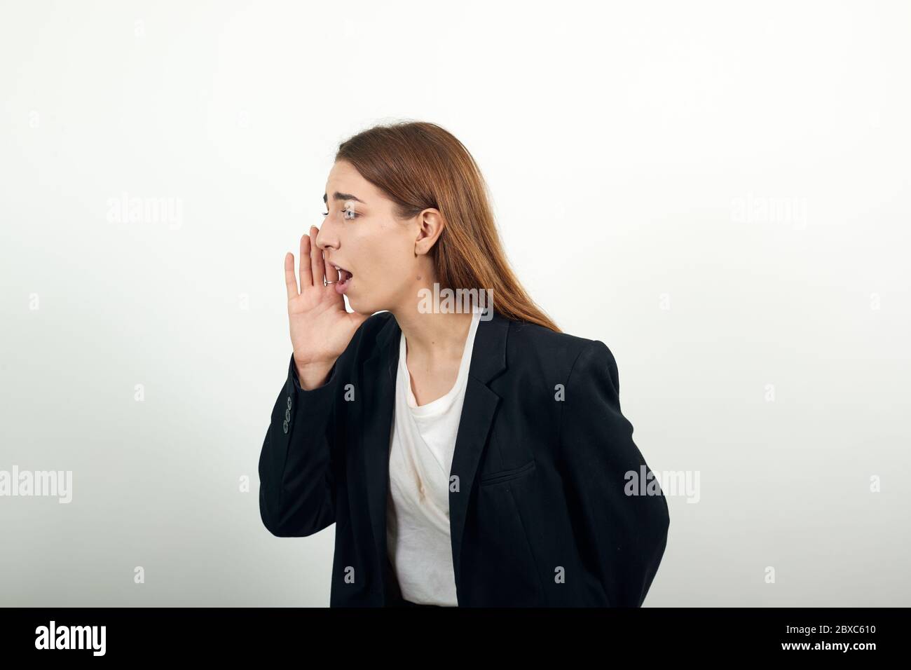 Scream and shout Holding hands near opened mouth. Screaming loudly with ...