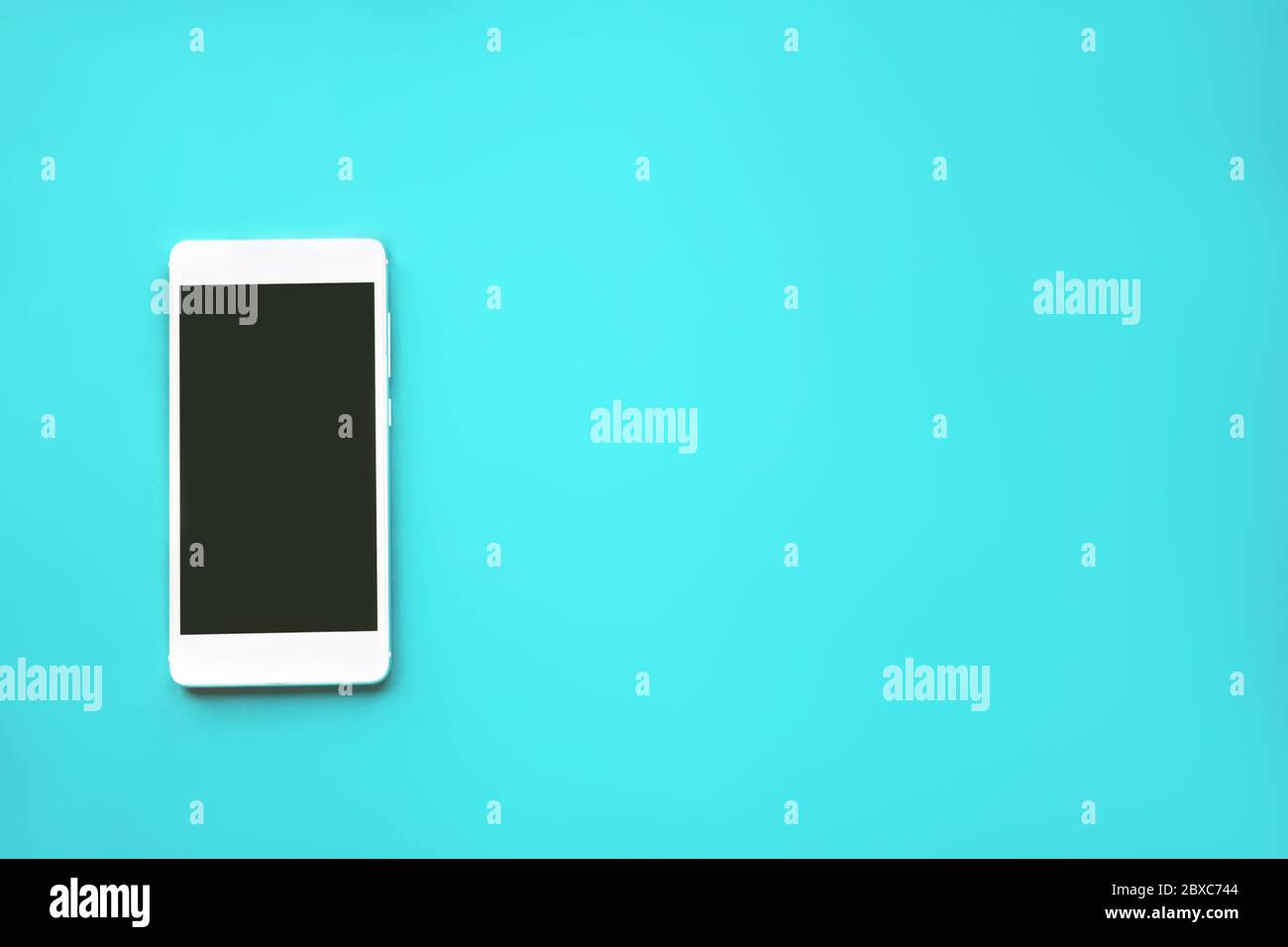 Smartphone on cyan background - Mobile Phone Template Stock Photo - Alamy