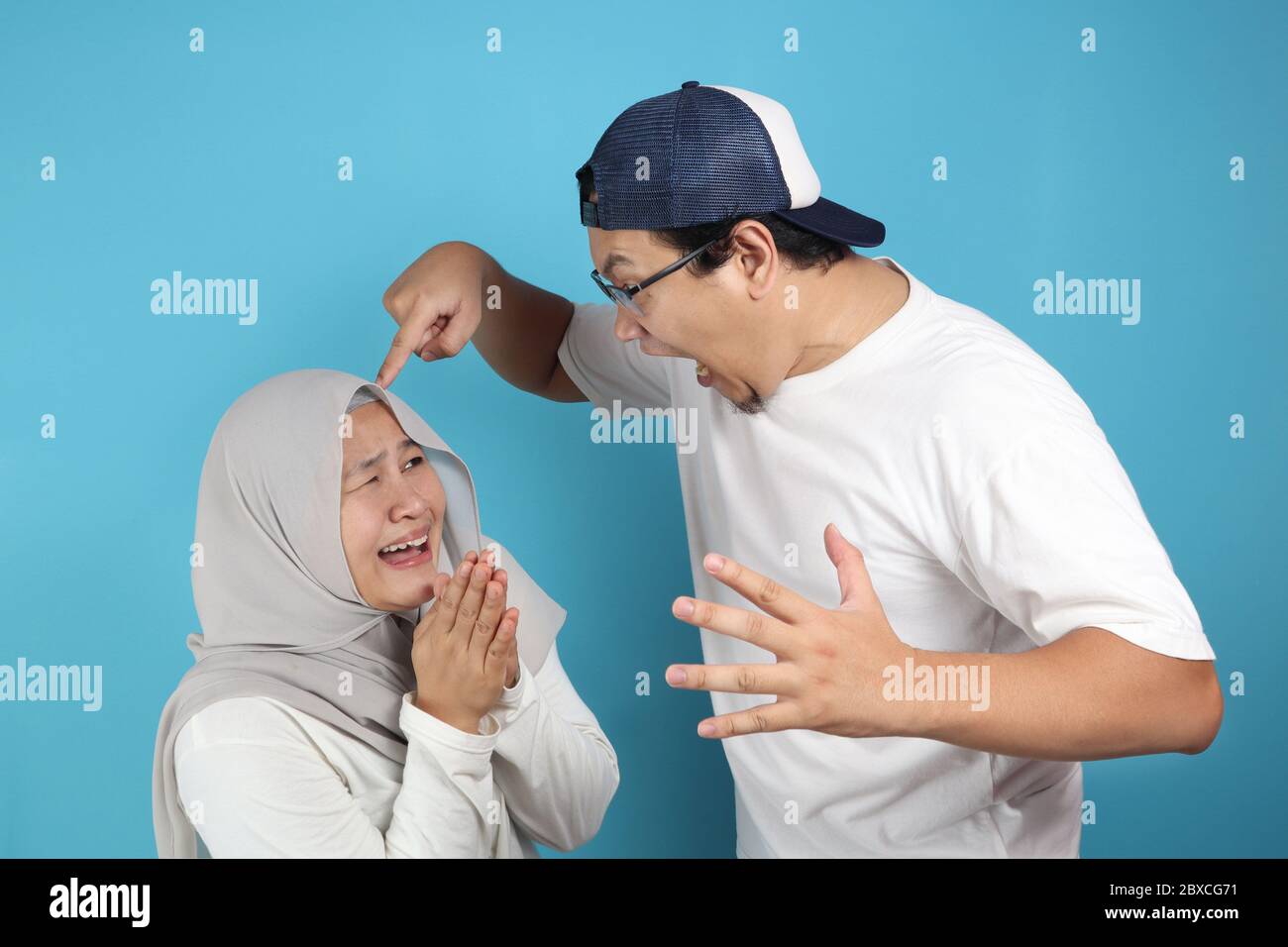 Portrait Of Funny Asian Muslim Couple Having Conflict Wife And Husband