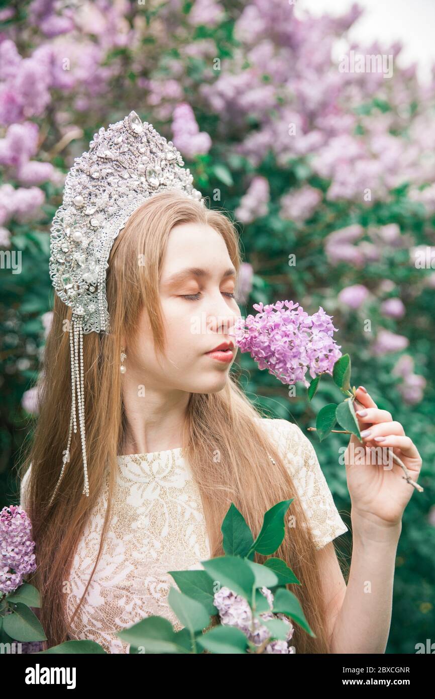 The girl in the crown. The magnificent Queen from a fairy tale among ...