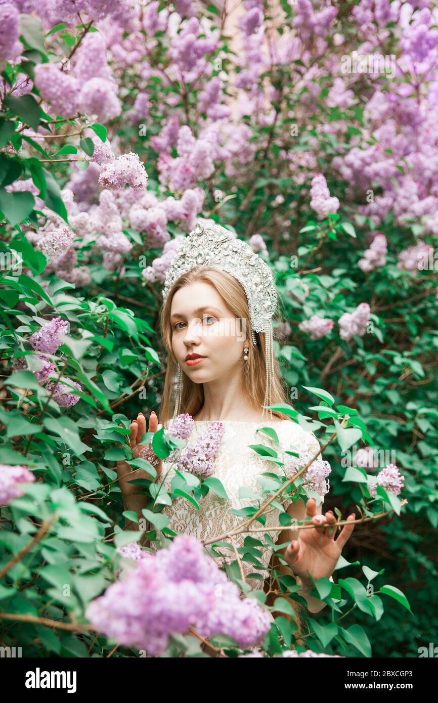 The girl in the crown. The magnificent Queen from a fairy tale among ...