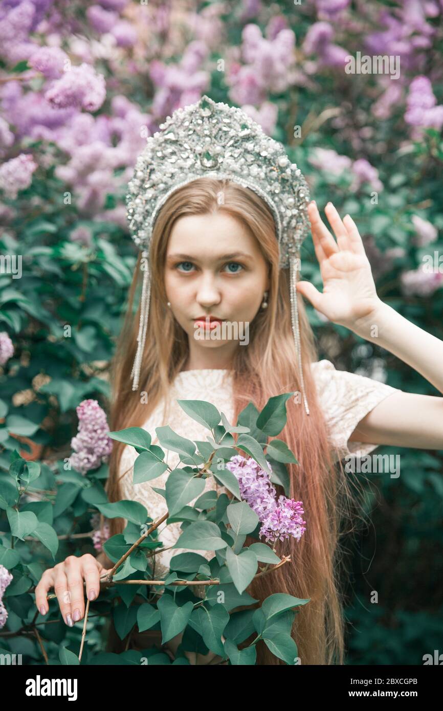 The girl in the crown. The magnificent Queen from a fairy tale among ...