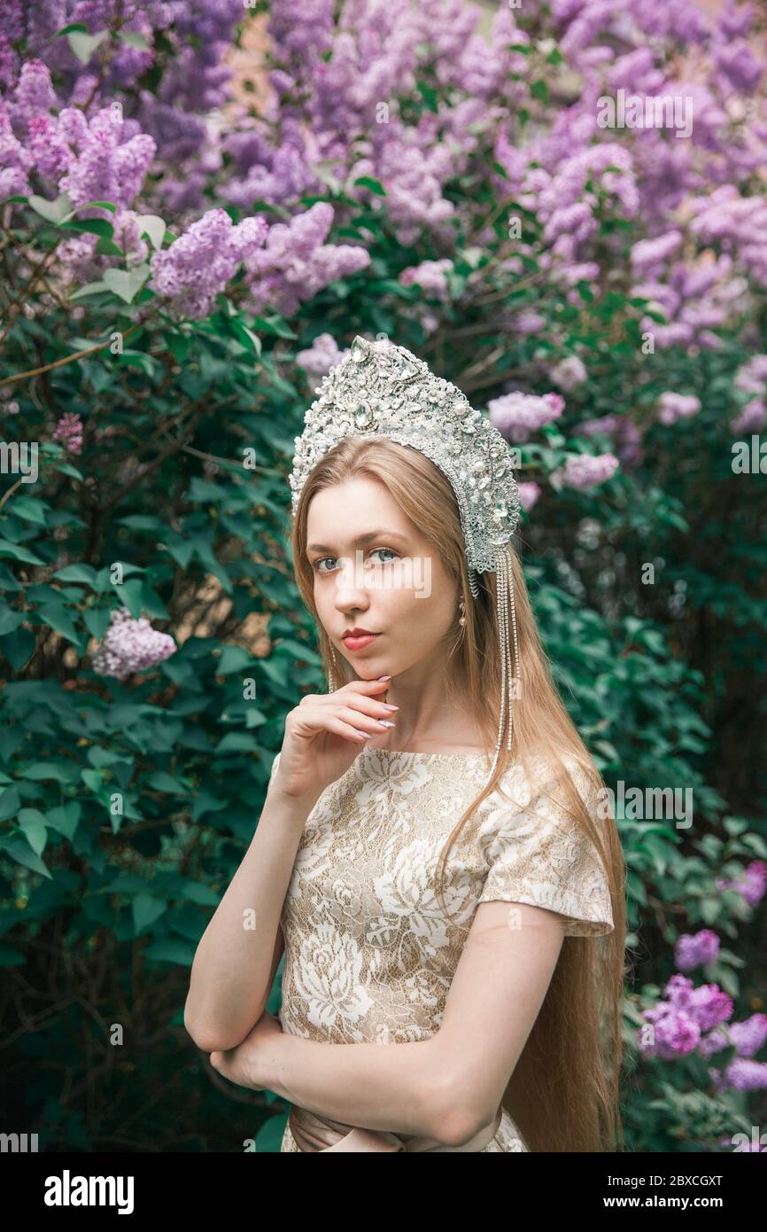 The girl in the crown. The magnificent Queen from a fairy tale among ...