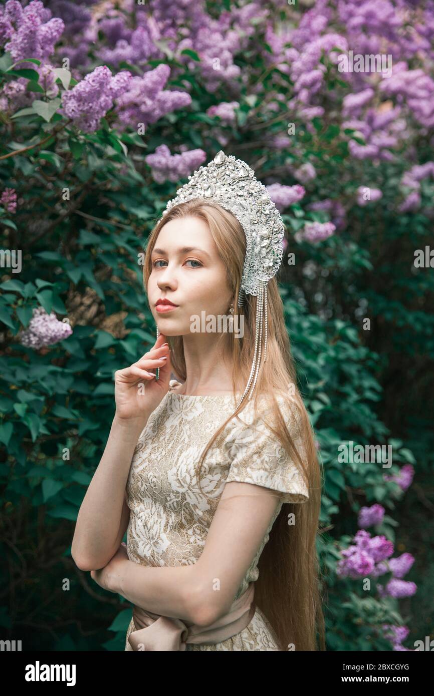 The girl in the crown. The magnificent Queen from a fairy tale among ...