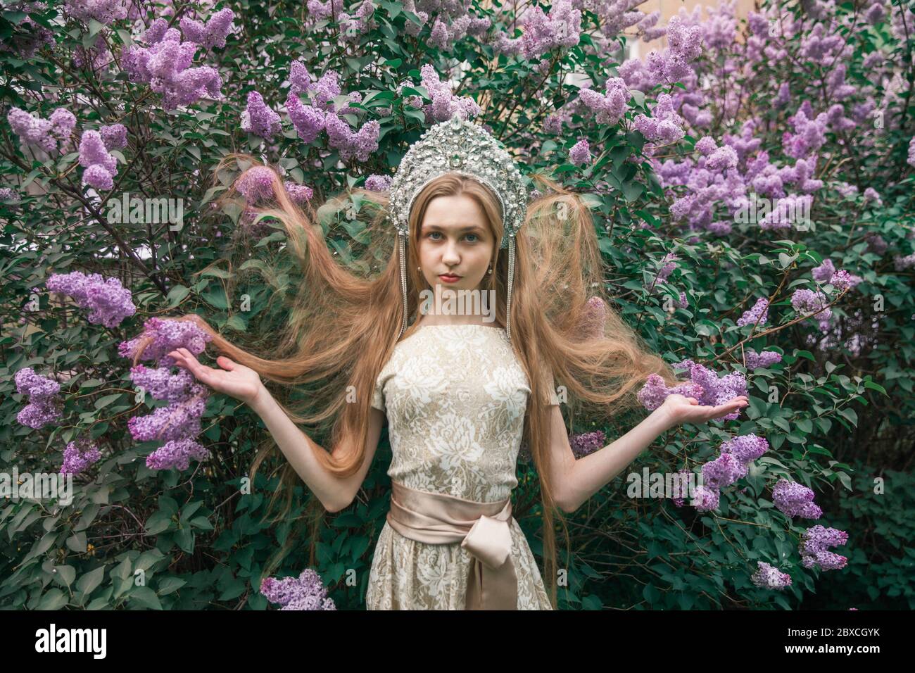 The girl in the crown. The magnificent Queen from a fairy tale among ...