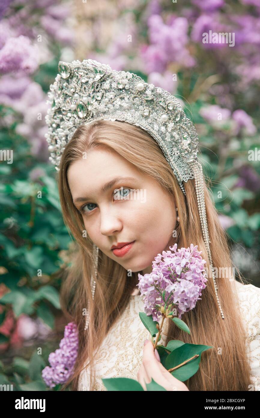 The girl in the crown. The magnificent Queen from a fairy tale among ...