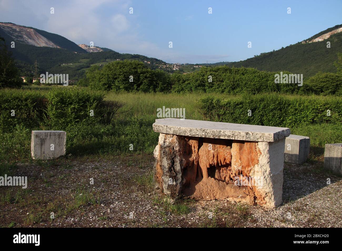 small stone altar in a meadow in Italy Stock Photo - Alamy