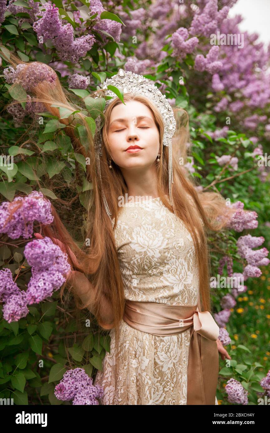 The girl in the crown. The magnificent Queen from a fairy tale among ...