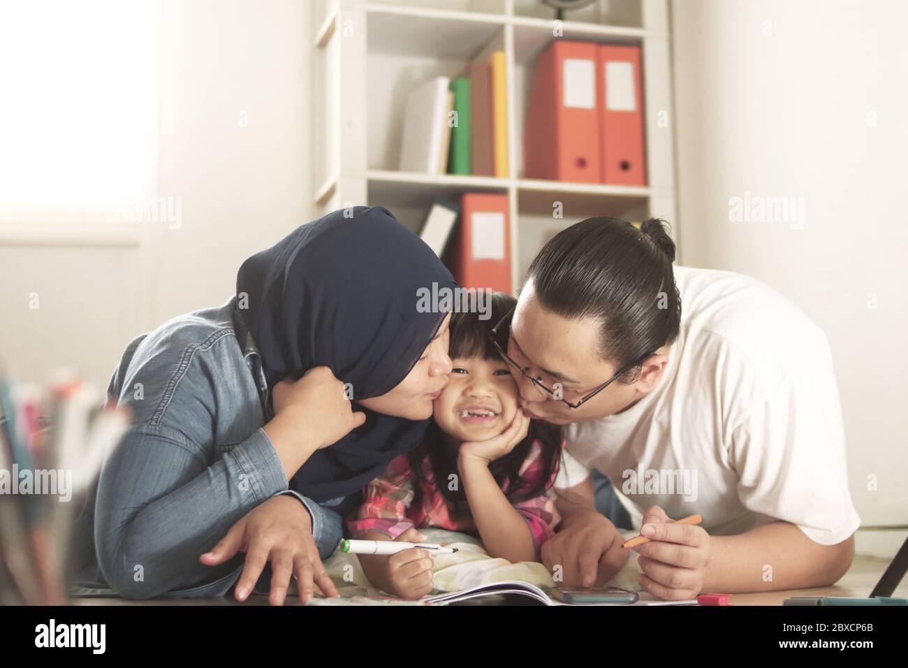 Indonesian Muslim Family Learning Together High Resolution Stock ...