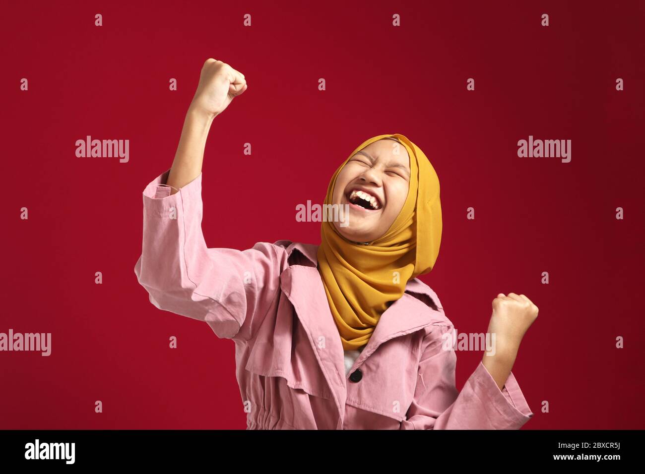Portrait of happy success confident young teenage Asian muslim girl ...