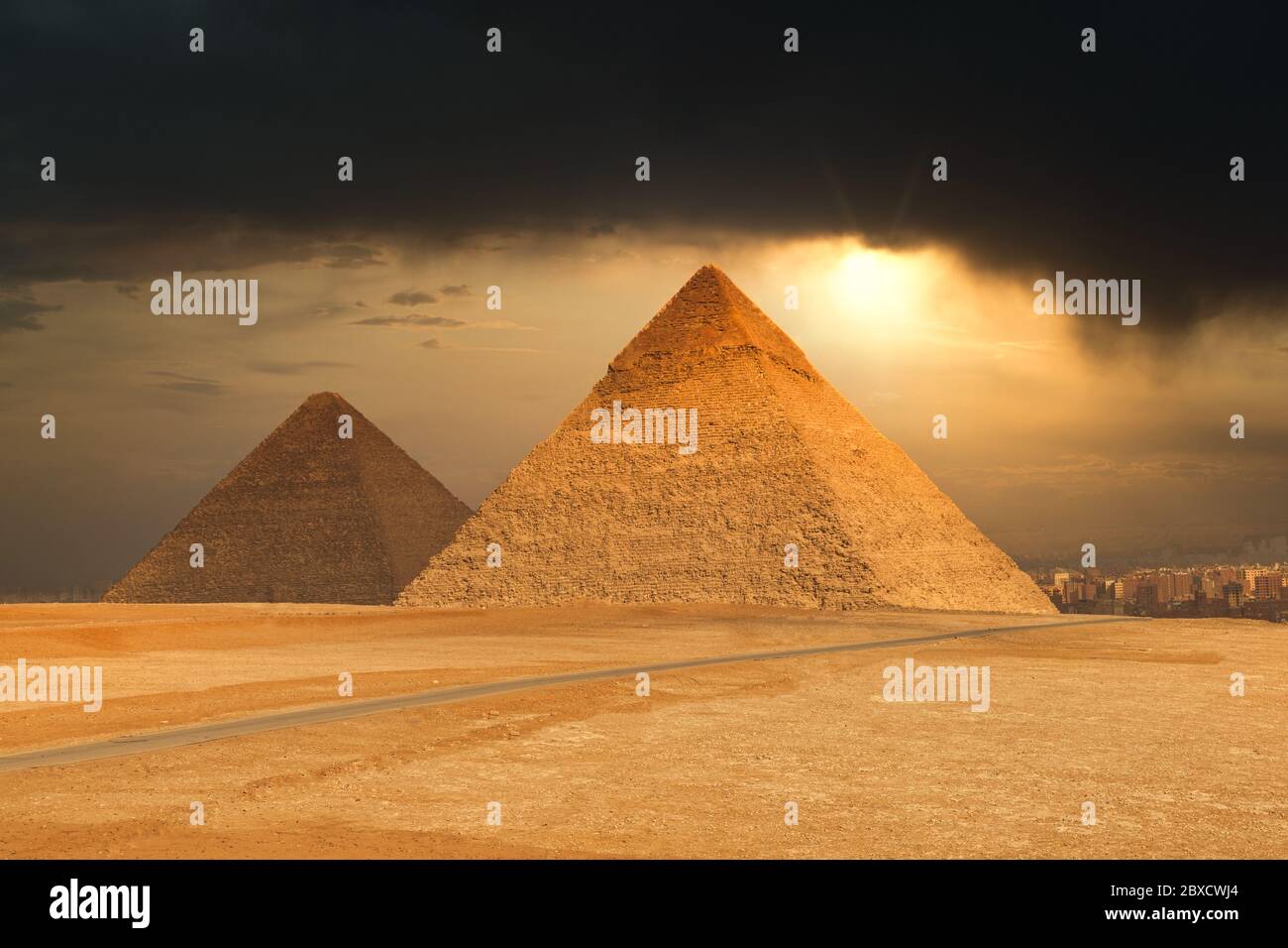 The famous pyramids at Giza in Egypt with a dark dramatic sky Stock ...