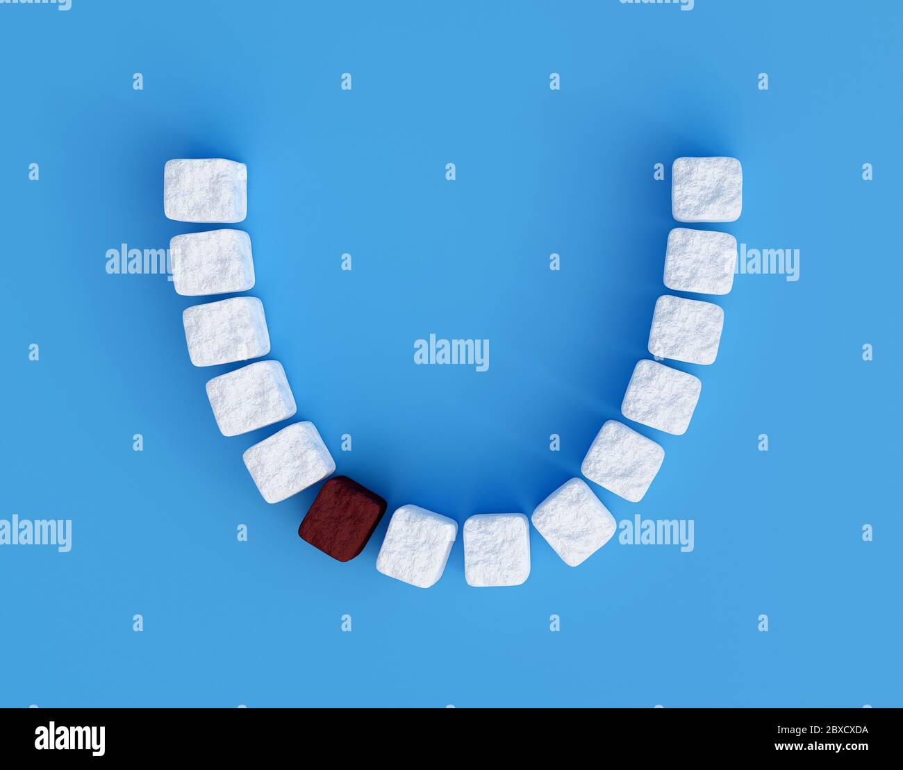 Teeth from sugar cubes on blue background, some brown sugar teeth ...