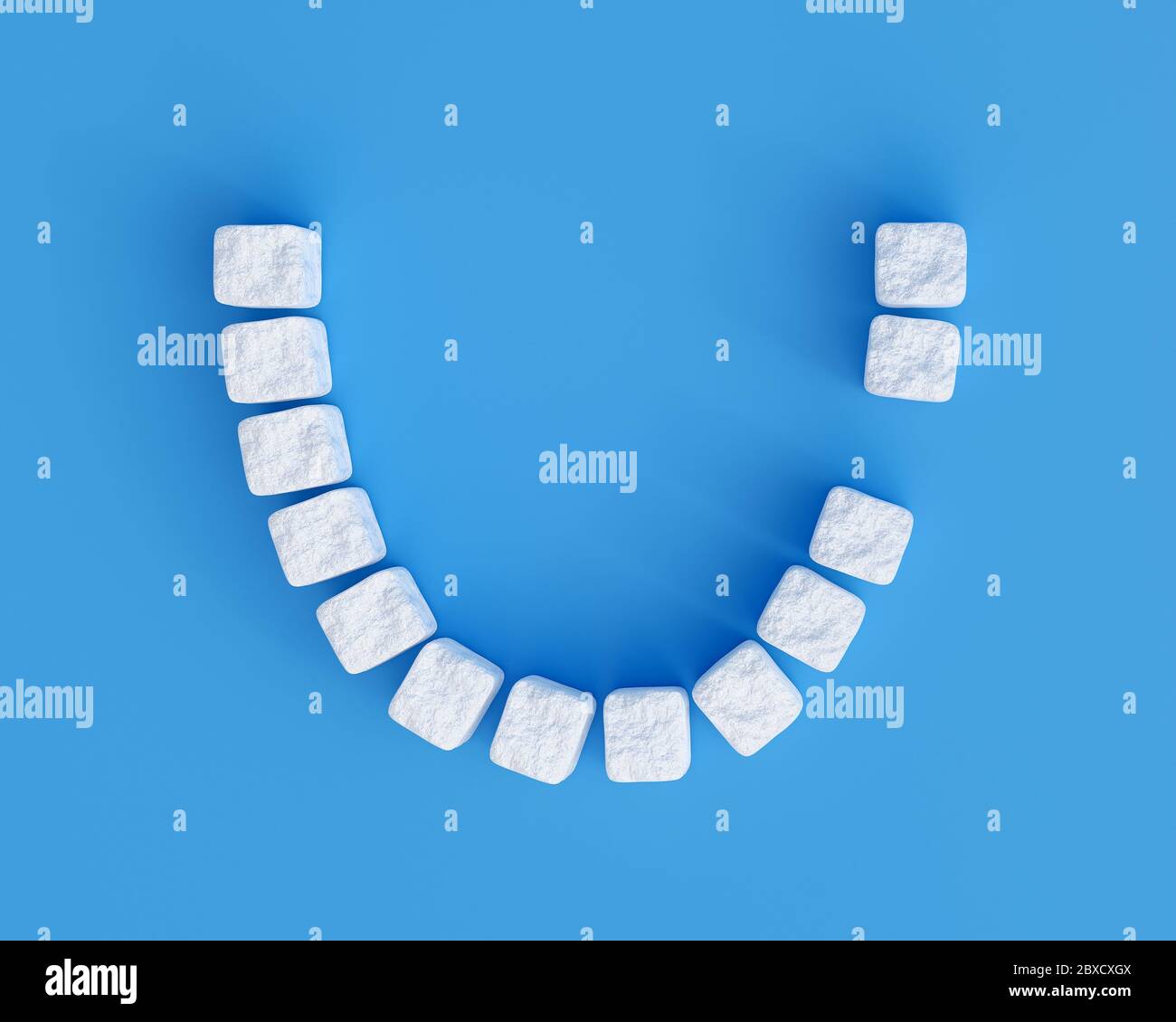 Teeth made of sugar cubes on blue background, one tooth missing. Sweet ...