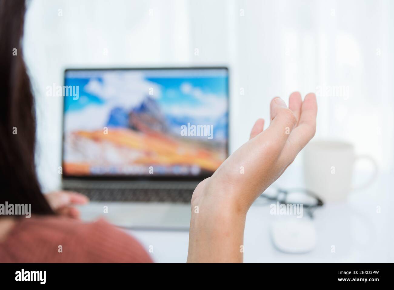 Work from home, Back of Asian young businesswoman video conference call ...