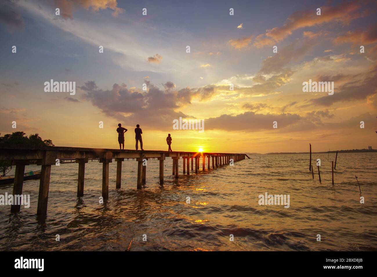 Beautiful sunset over long jetty hi-res stock photography and images ...