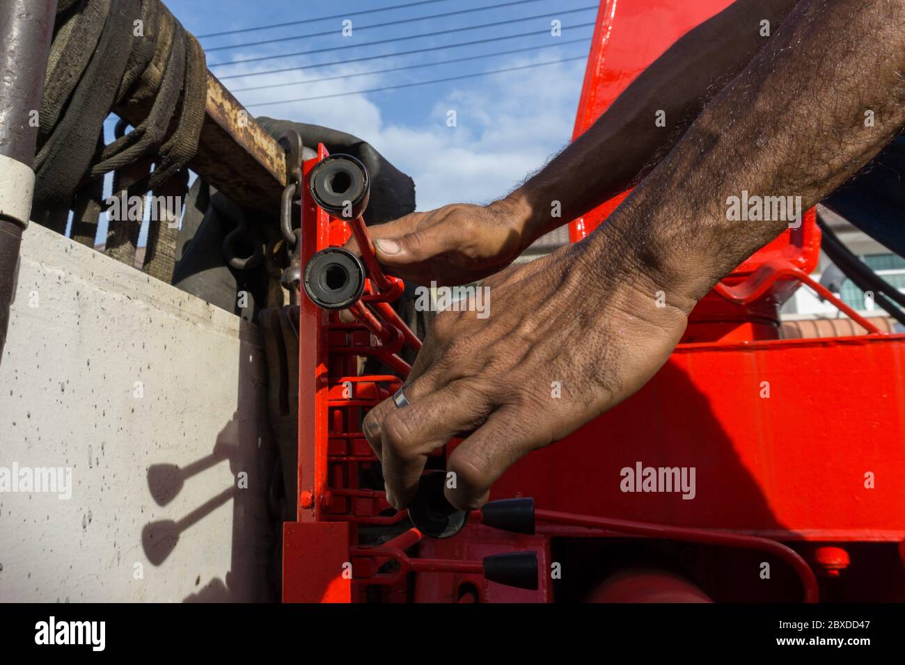 A worker hand with Lorry Crane control - Industrial Concept Stock Photo ...