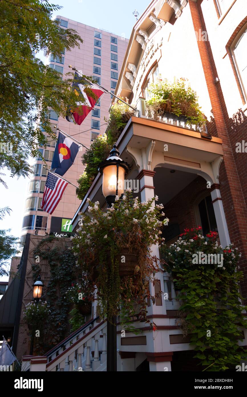 Three Flags on Historic Building and Skyscraper Downtown Denver ...