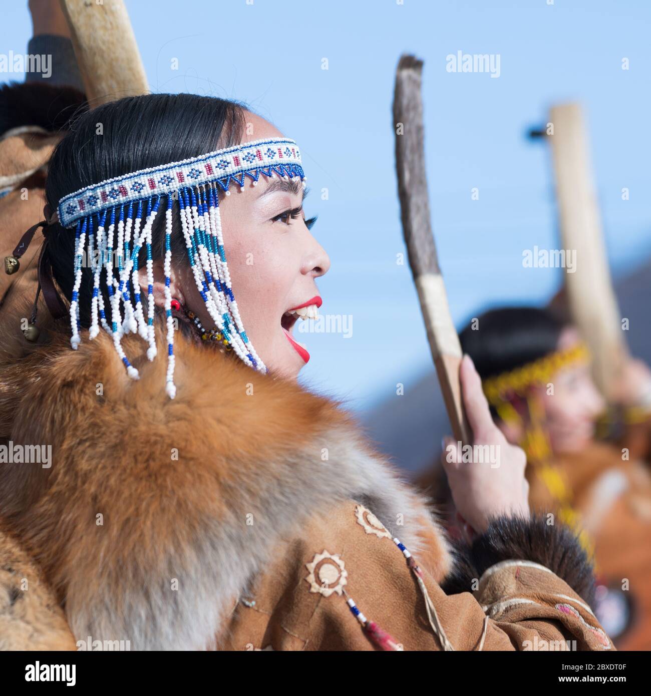 Female dancing with tambourine in tradition clothing aboriginal people ...