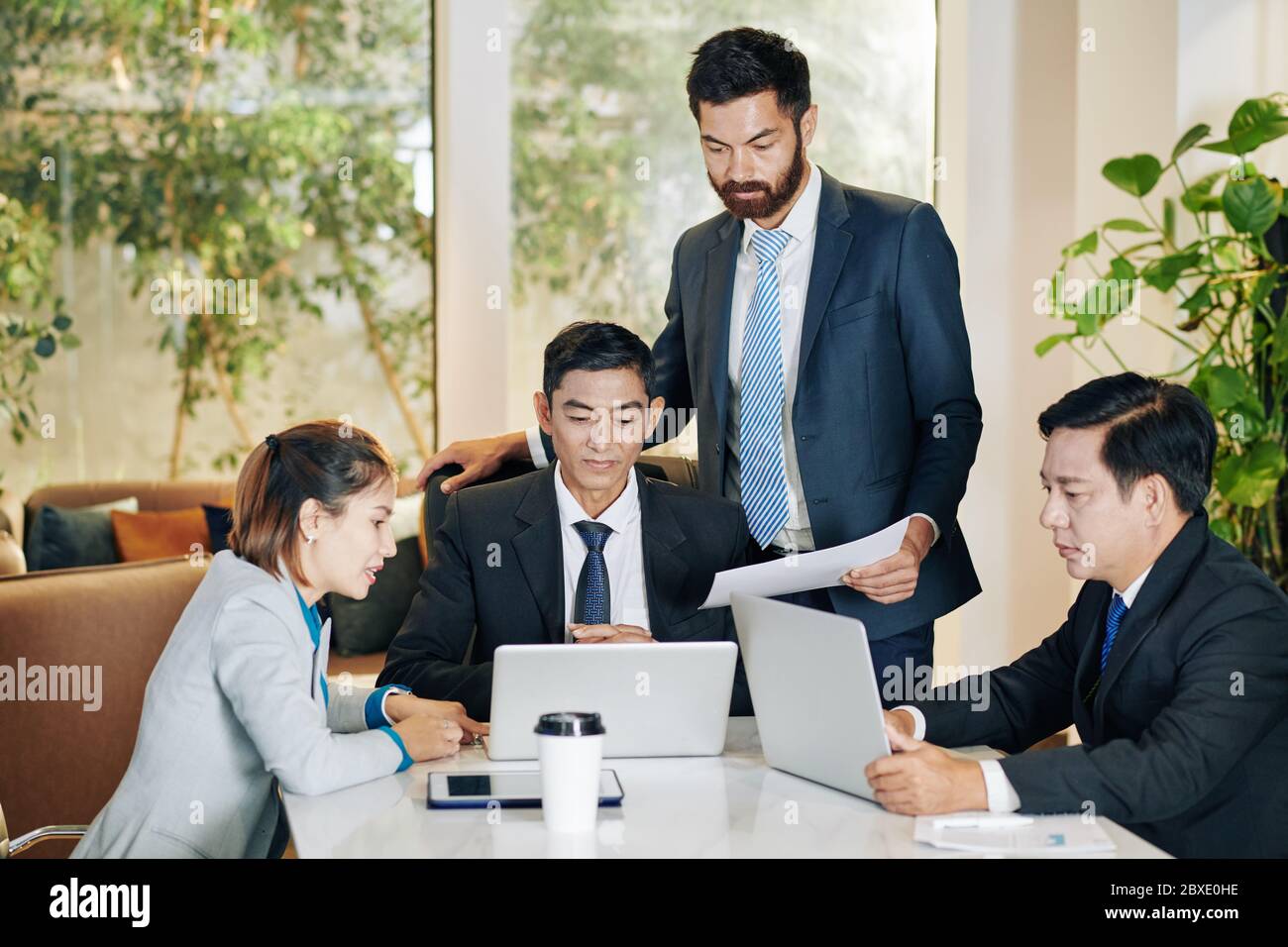Business people discussing problem solution at emergency office meeting ...