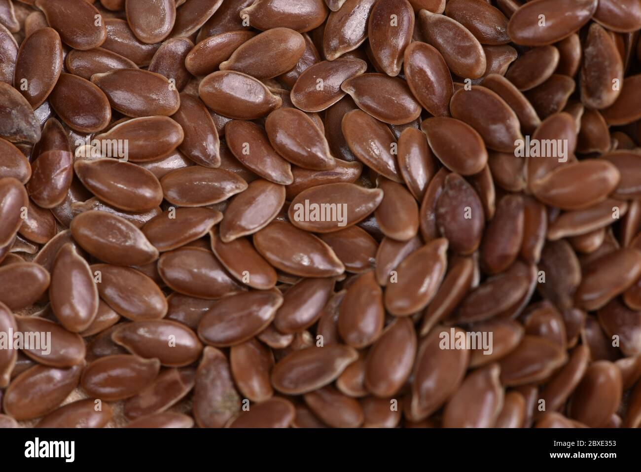Flax seeds pouring end rotating in slow motion. flax seeds Stock Photo ...