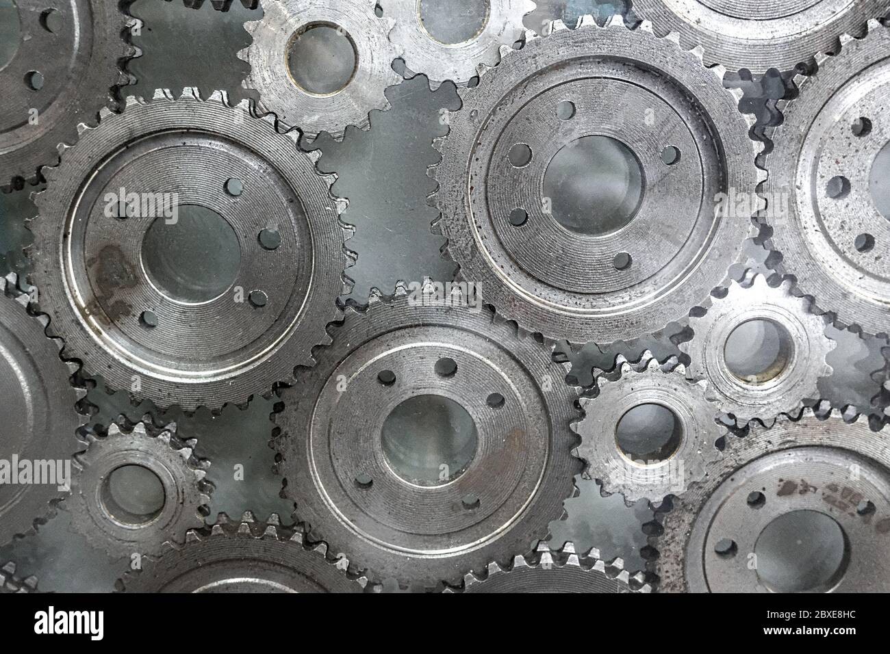 Steel parts for industrial machinery round shape. Selective toning ...