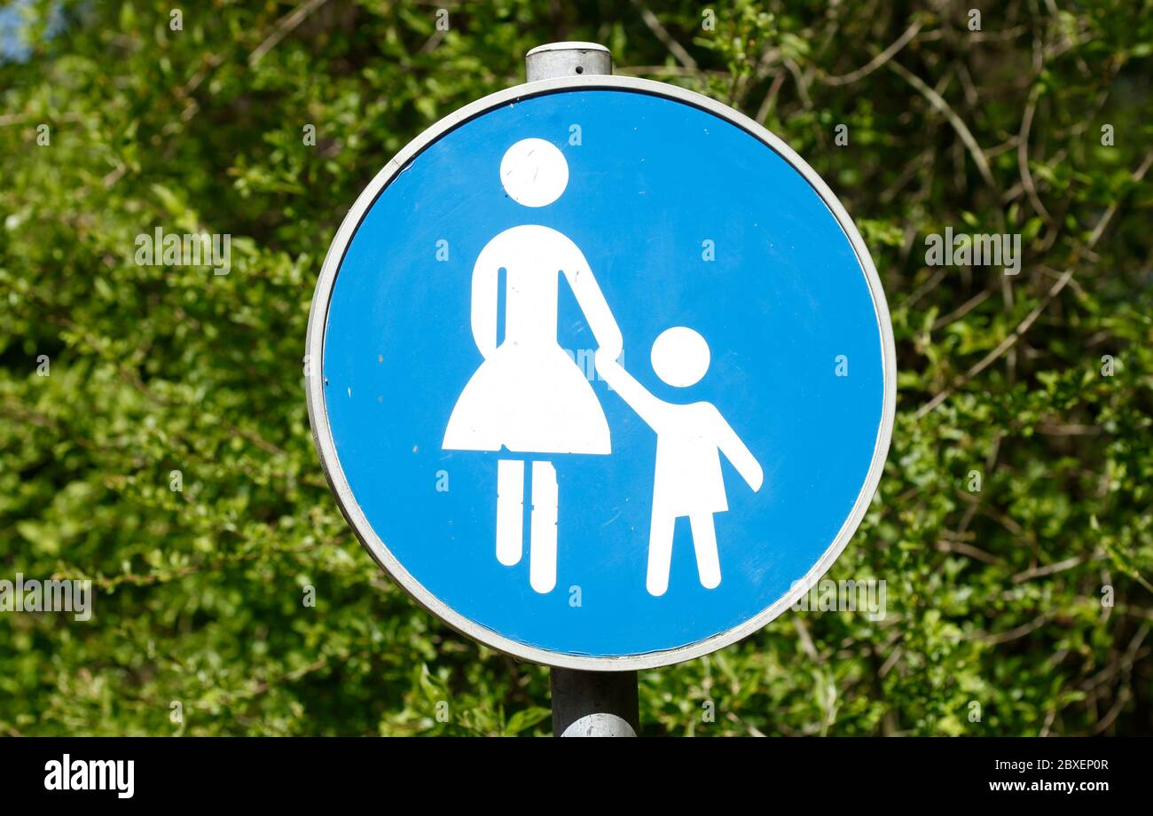 Road sign pedestrian path, green background, Germany, Europe Stock ...