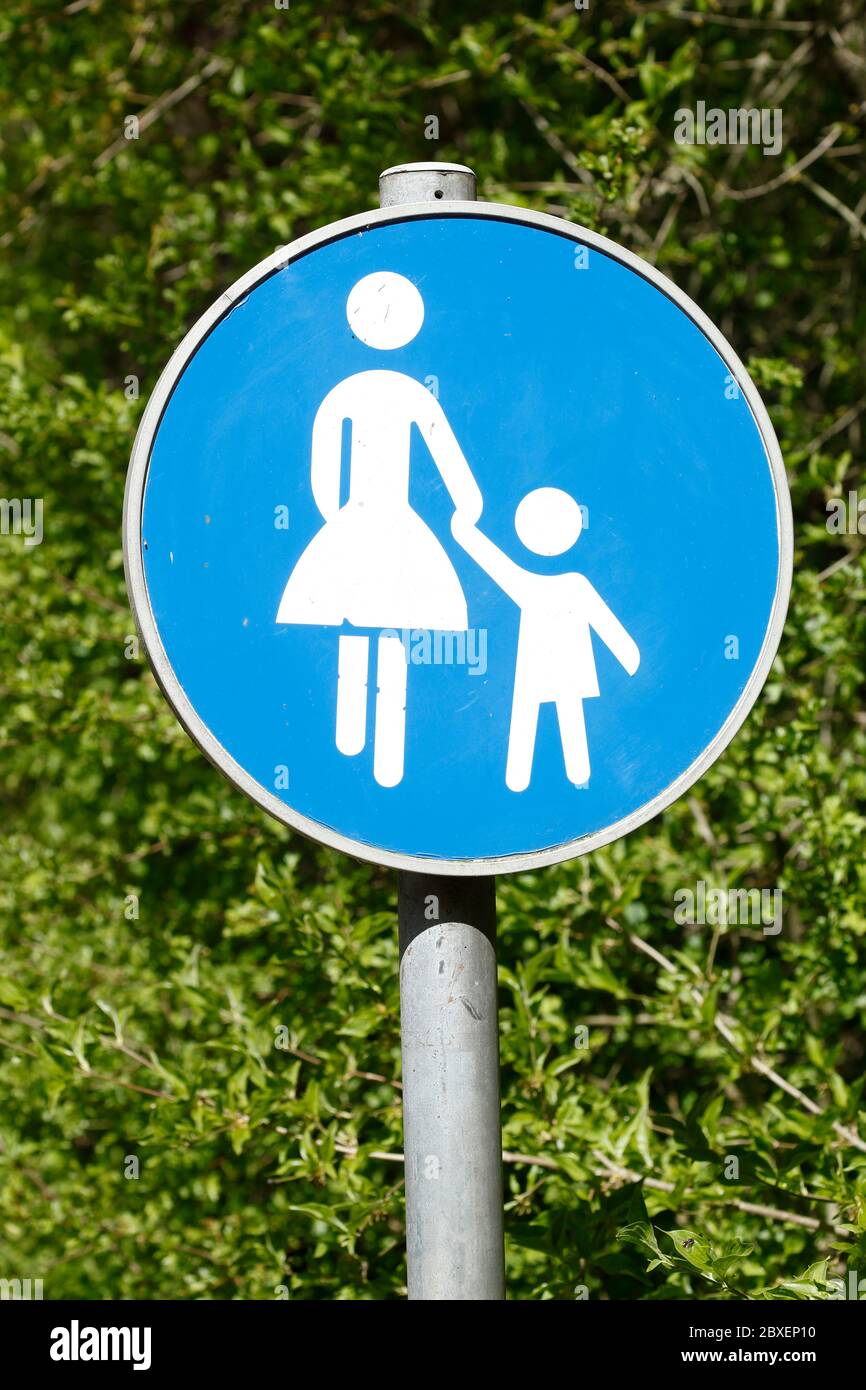 Road sign pedestrian path, green background, Germany, Europe Stock ...