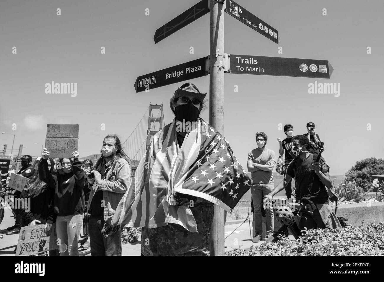Protestors at gate Black and White Stock Photos & Images - Alamy