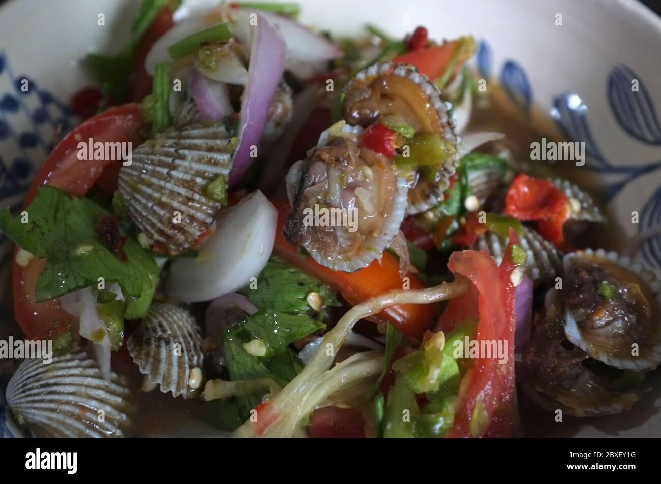 CLOSE UP view , Cockles salad / Hot and spicy shellfish blood cockles ...
