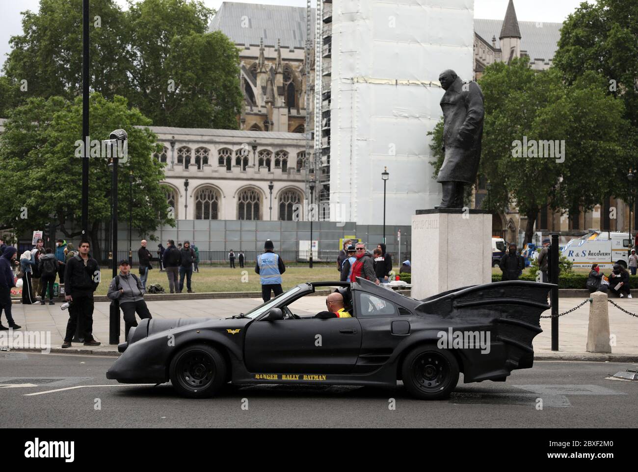 London, UK. 06th June, 2020. A 'Batmobile' drives around Parliament ...
