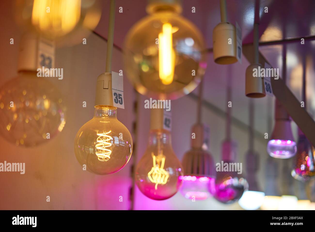 bright incandescent lamps hang in the window Stock Photo - Alamy