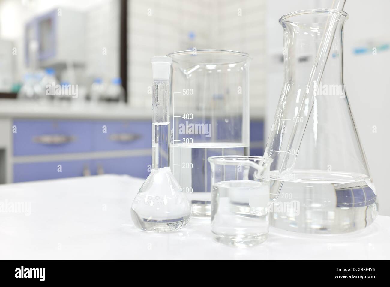 Chemistry Science laboratory flask, beaker and glassware with clear ...