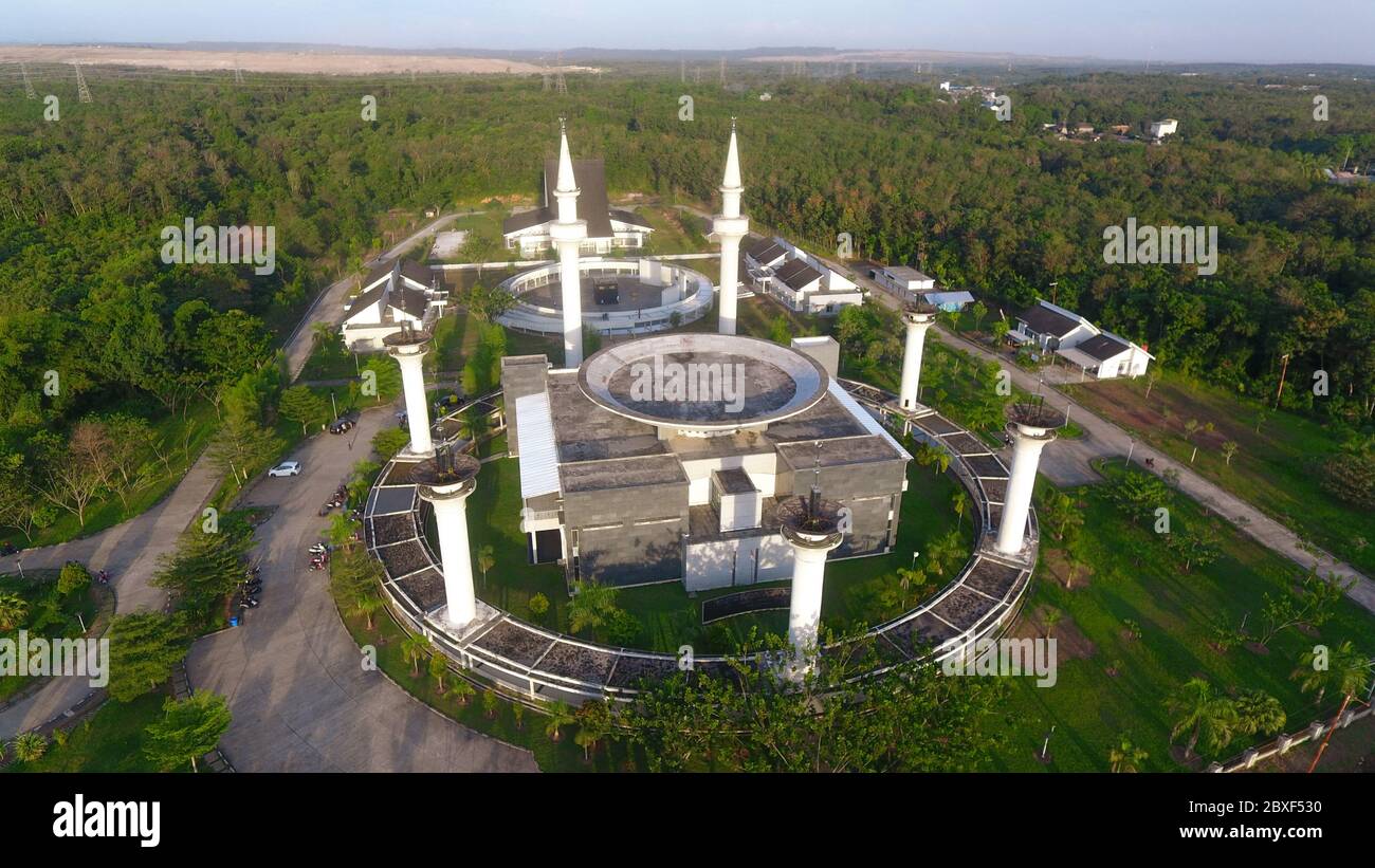 Aerial view of Al Abrar Mosque with forest background in the month of ...