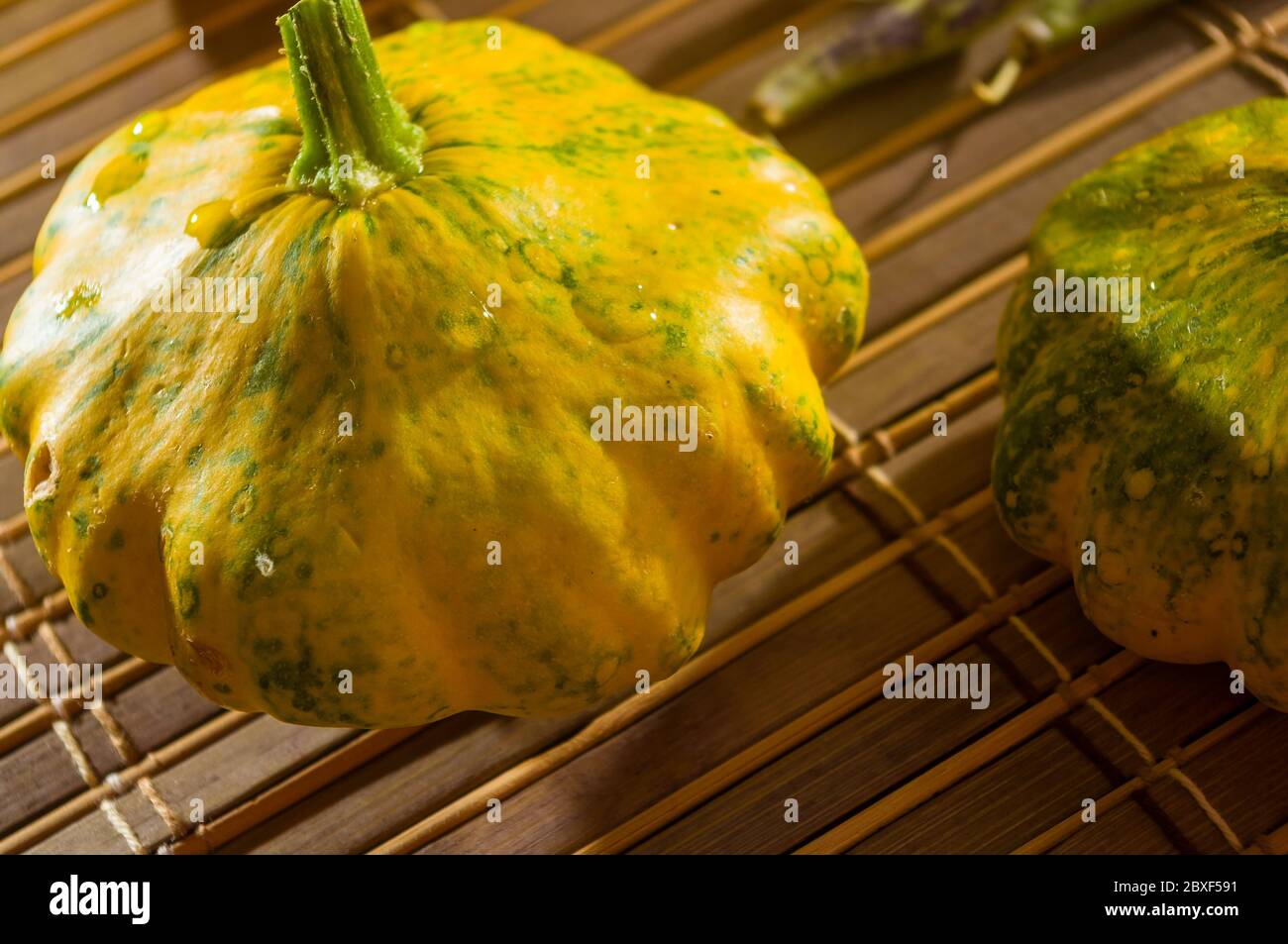 Autumn still life - small spotted squash, asparagus beans, purple Basil ...