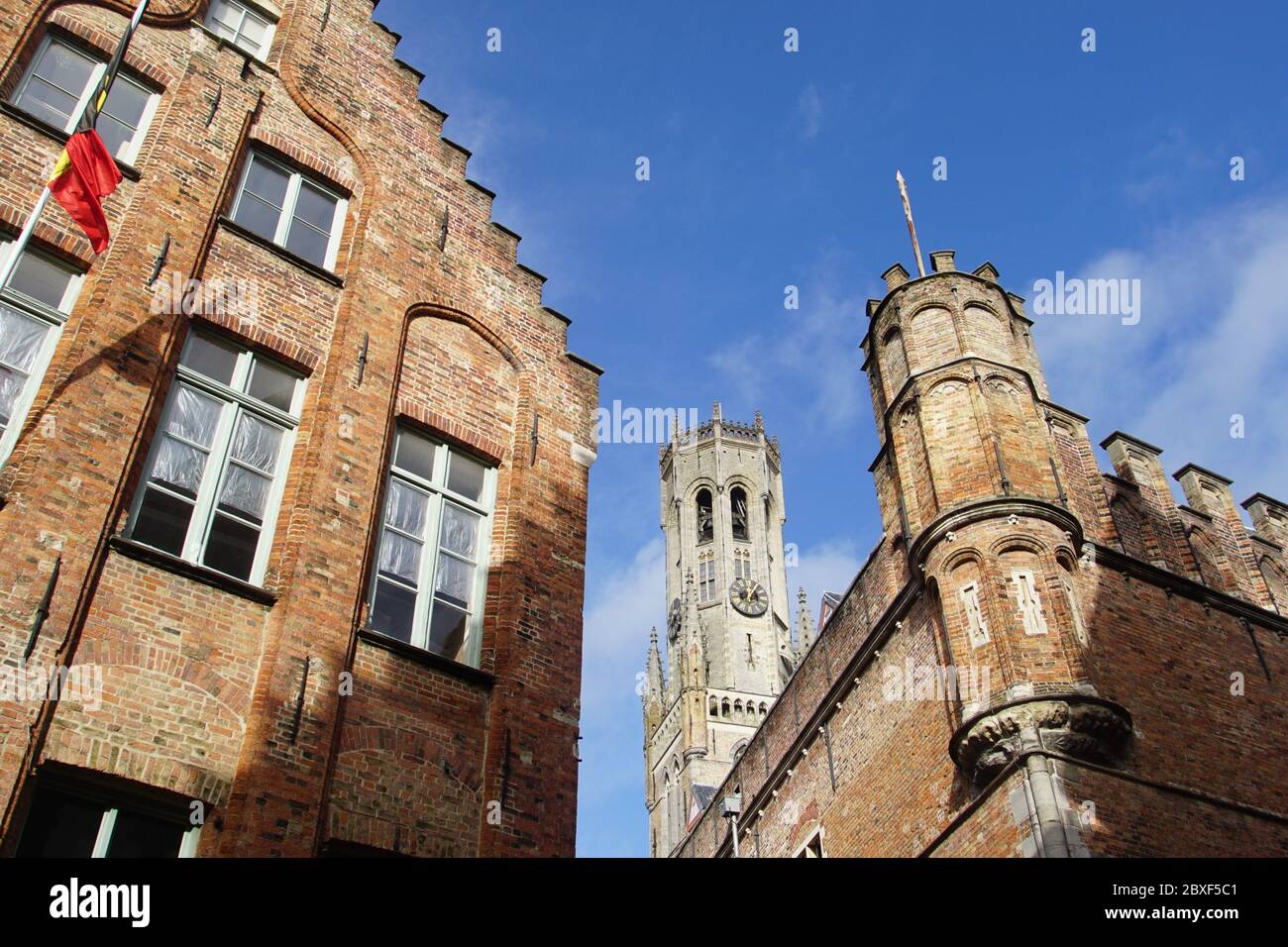 Medieval Buildings in Front of Bruges’ Belfry Stock Photo - Alamy