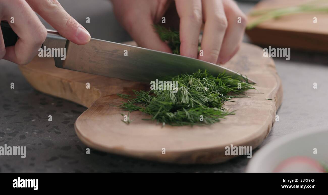Chopping cook hands slicing hi-res stock photography and images - Alamy