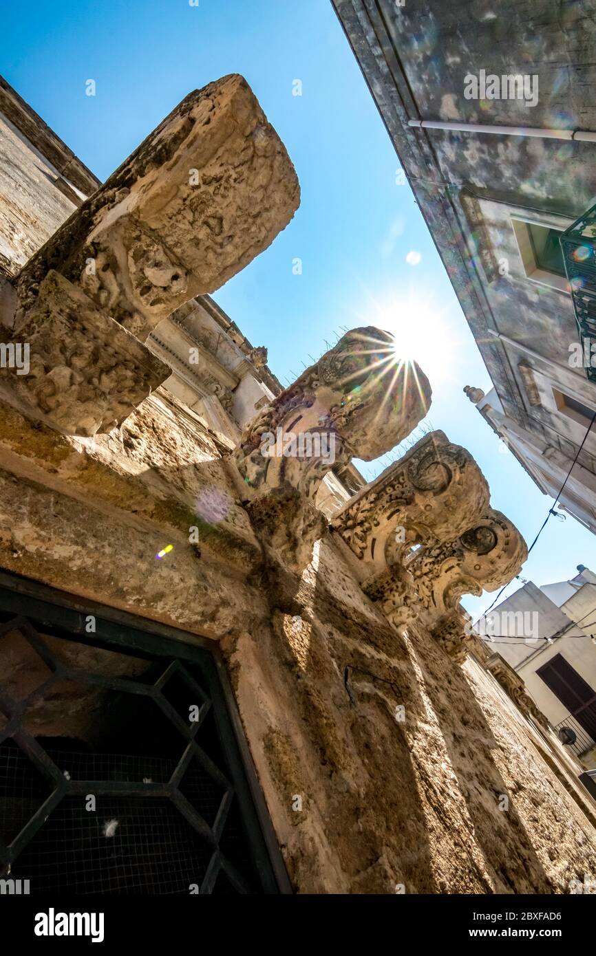 Sun rays diffraction light photo effect in alleyway on the streets of ...