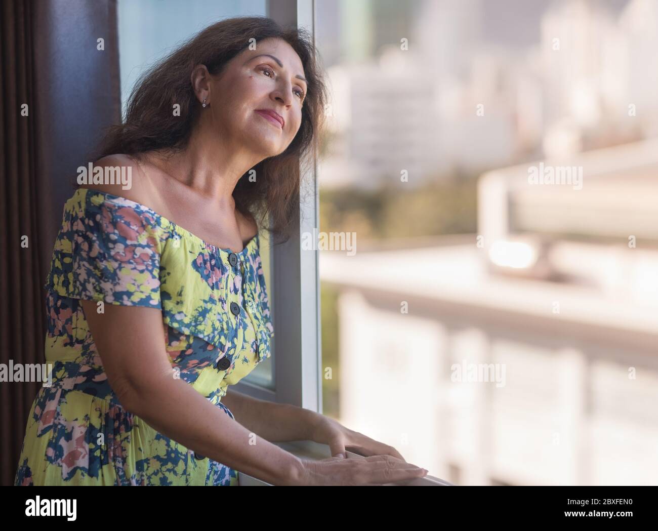 Elderly lady smiling window hi-res stock photography and images - Alamy
