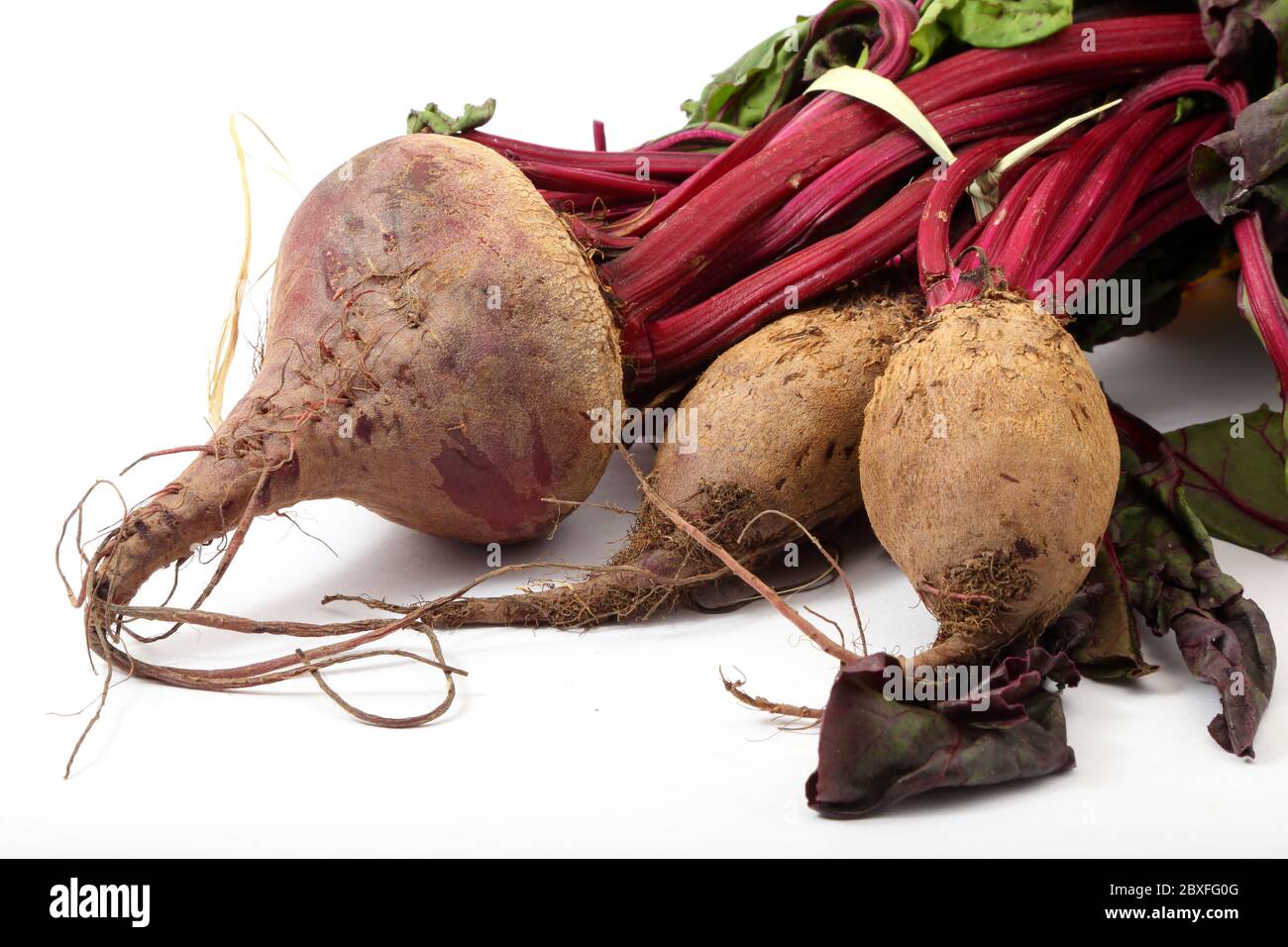 Bunch of beetroot isolated on white background Stock Photo - Alamy
