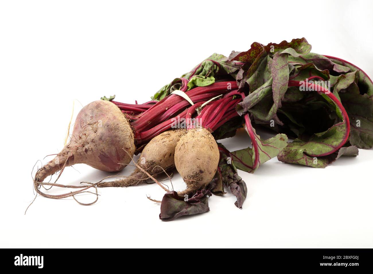 Bunch of beetroot isolated on white background Stock Photo - Alamy